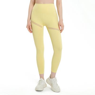 China Calças justas Nude dos esportes da cintura alta das mulheres de Traceless Mesh Breathable Yoga Pants Capri à venda