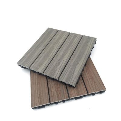 Cina Piastrelle di pavimentazione in WPC/PVC di co-estrusione DIY all'aperto con design moderno e facile installazione in vendita