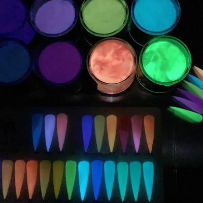 China Custom logo 100% Organic Neon Pigment Dip Powders Kit Nail Glow in the Dark Color Dipping Powder for sale
