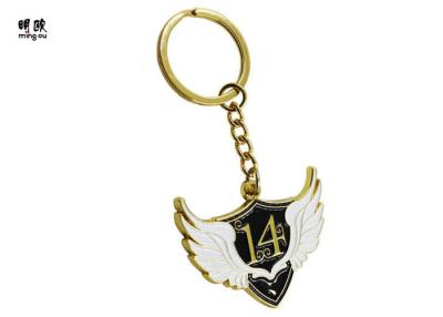 China Voe o revestimento feito sob encomenda dado forma do ouro dos Keyrings do metal com esmalte branco/preto à venda