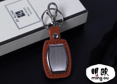 Cina Keychain a incisione laser personale con il piatto di nichel brillante, etichetta del tasto del cuoio dell'unità di elaborazione in vendita