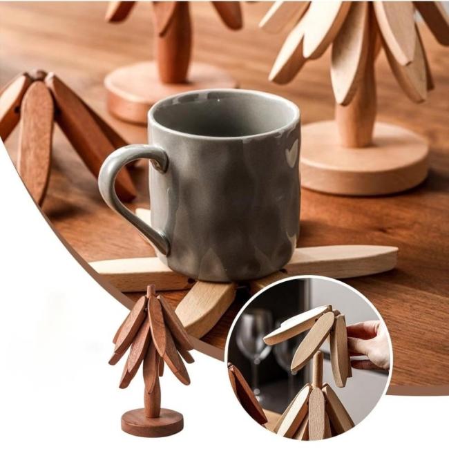 Close-up of a single wooden tree trivet unfolded on a tabletop, showing six wooden segments
