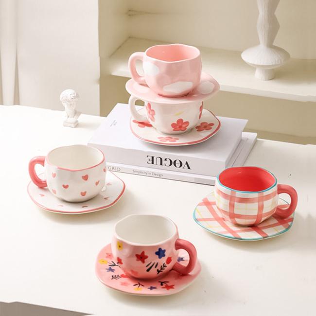 Floral ceramic coffee mug set showing printed pattern detail