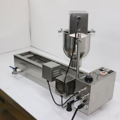 Chine Rangée simple à cuire commerciale Mini Donut Machine automatique de machines de casse-croûte d'équipement à vendre