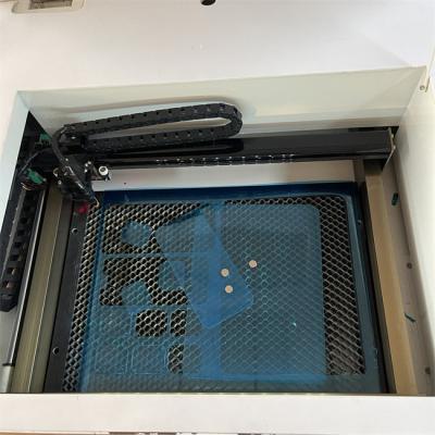 China Air Cooling Screen Protector Laser Cutting Machine with High Cutting Accuracy and Cooling Model Circulating Water Cooling for sale