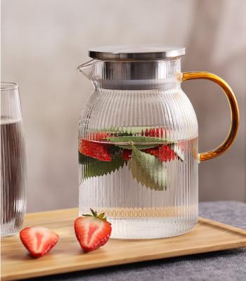 Cina Lanciatore dell'alta teiera del vetro borosilicato di Novolink chiaro con la maniglia gialla per le bevande calde e fredde 1200ml in vendita