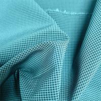 Quality 100D 140gsm Cationic Small Grid Four Sided Elastic Beach Pants Windbreaker Fabric for sale