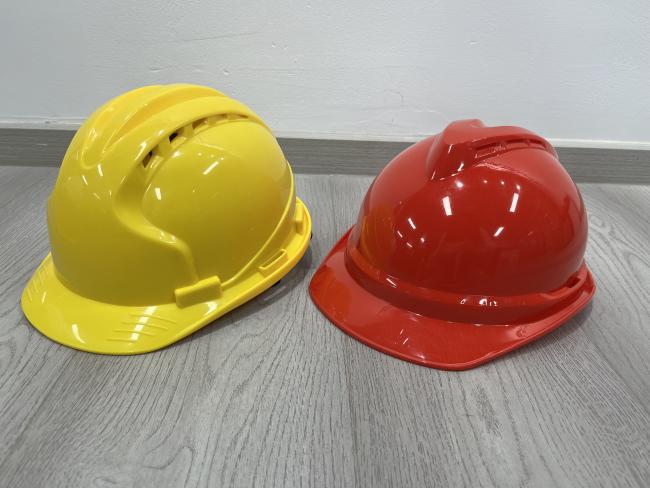 High visibility safety helmet front view showing impact-resistant construction