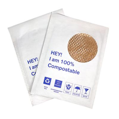 China Customizable Honeycomb Kraft Paper Mailer with Double Adhesive Strip for Secure Shipping for sale