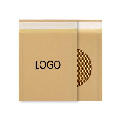 China Biodegradable Honeycomb Cushion Paper Mailer Kraft Mailing Bags Padded Honeycomb Express Protective Mailer Envelope Postal Bags for sale