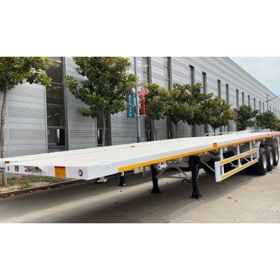 Κίνα 20/40/45ft κοντέινερ επίπεδα ημιπροκατασκευή με 2-3 άξονες και μεγάλη χωρητικότητα φόρτωσης προς πώληση