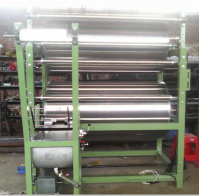 China 2 cilindros de calidad superior que acaban y starching la calefacción eléctrica de la máquina para la cinta de la cremallera, cordón de la cinta, honda de las correas en venta