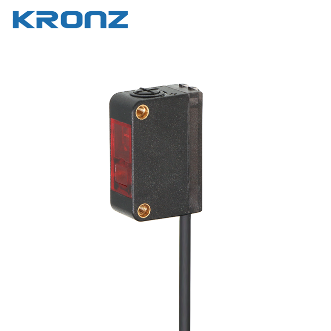 Photoelectric sensor front view showing infrared emitter and receiver components