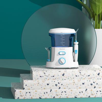 China Fio dental de água ABS ajustável de 600 ml para uso familiar spa oral branco azul à venda