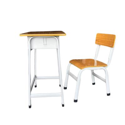 China Wood Grain Student Desk And Chair Customized Classroom Table And Chairs Set for sale