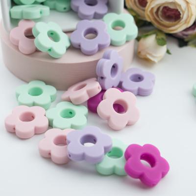 Chine Perle de dentition en silicone avec trous de fleurs 4,5 cm pour collier à mâcher avec attache-sucette bricolage à vendre