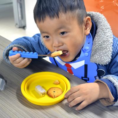중국 주문 제작된 아기 실리콘은 식품 등급 방수 유아들 BPA 무료 앞치마의 가슴부분을 비브스 판매용
