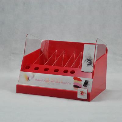 中国 より多くのコンパートメントが付いている赤いプラスチック アクリルのマニキュアの陳列台 販売のため