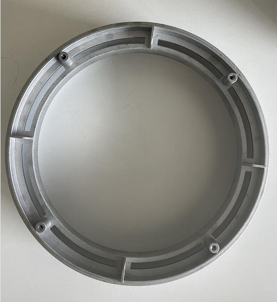 Custom aluminum die casting chassis part showing detailed manufacturing and surface finish