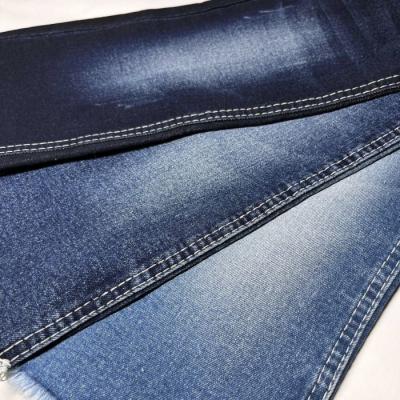 Cina Il colore acceso normale 10,9 del tessuto del denim della saia di Oz fissa il materiale dei jeans in vendita