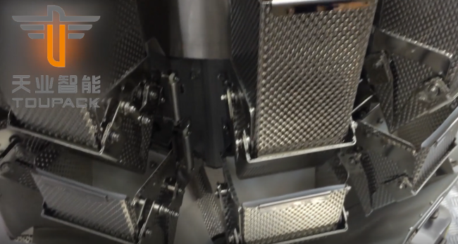 Weigher component of the packaging machine