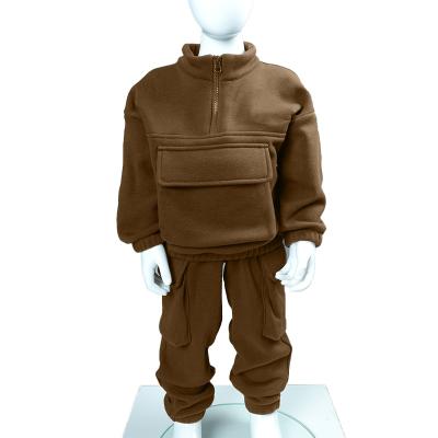 Cina La mezza tuta sportiva del vello della chiusura lampo ha messo i bambini 300gsm la maglietta felpata calda che dell'inverno con 3D intasca l'insieme del pareggiatore dei bambini di Sweatpants in vendita