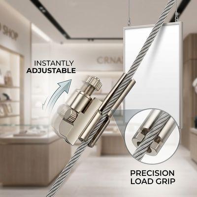 Adjustable bottom exit brass cable gripper application in signage display hanging system