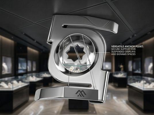 Chrome ceiling attachment suspending a retail display signboard