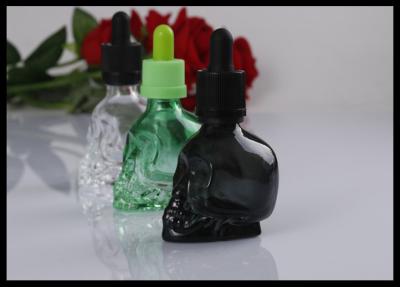 Cina Il contagoccia di vetro dell'olio essenziale del cranio 30ml imbottiglia la chiara bottiglia nera verde in vendita
