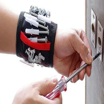 China Electrician Adjustable Wrist Belt Strong Magnetic Wristband Portable Tool Bag with Customized Screws Package Size 5.00cm * 4.00cm * 3.00cm for sale