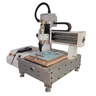 China High Precision CNC Router Engraving Machine Advertising Portable Mini Cnc Router Te koop