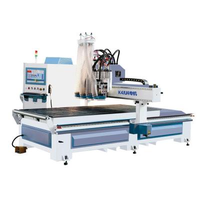 Cina 3d Multi Head Woodworking CNC Router Cnc Solid Wood Cutting And Drilling Machine in vendita