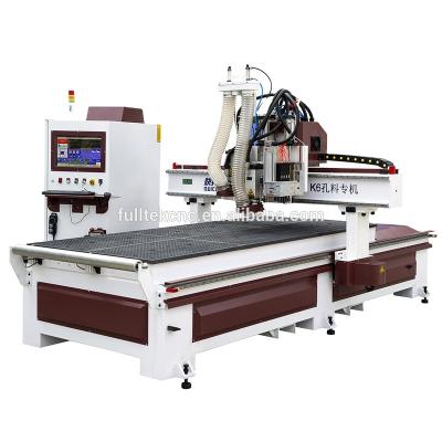 Cina New Product Woodworking CNC Router Wood Porous Making Machine in vendita