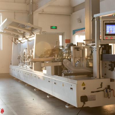 Cina High Speed Wood Edge Banding Machine Cabinet Making PVC Automatic Edge Trimming Machine in vendita