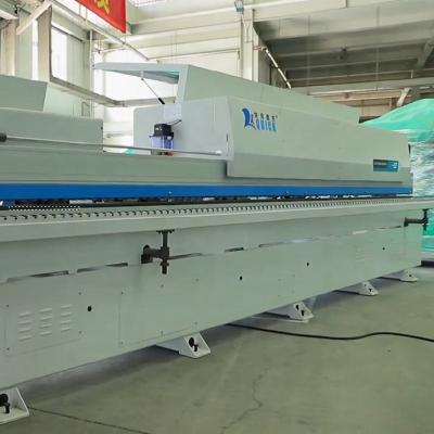 Cina Cnc Edge Banding Machine Edge Trimming Machine for sale in vendita