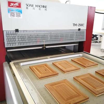 Cina Wooden Door automatic Vacuum Press Machine for sale in vendita