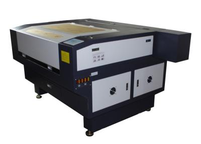 Cina Piccola tagliatrice del laser di CO2 cuoio/dell'abito con la tavola di funzionamento del favo o la tavola della striscia in vendita