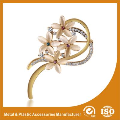Cina Fibule fatte a mano decorative dell'oro per i vestiti con le pietre di cristallo in vendita