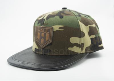 Китай Изготовленные на заказ вышитые бейсбольные кепки армии Snapback Camo с кожаным логосом заплаты продается