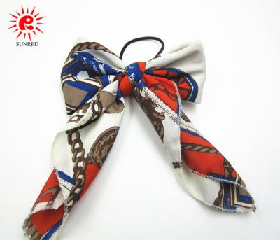 Cina Capelli di nylon Scrunchies di forma di Bowknot con il supporto elastico della coda di cavallino dell'anello in vendita