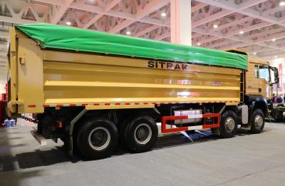Chine 24 mètres cubes camion-déchargeur pour Sinotruck Howo 12 roues Euro 5 Rhd 50 tonnes 8x4 à vendre