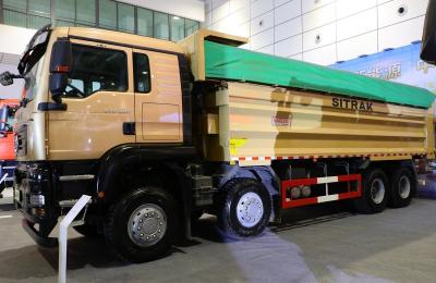 Chine 24 mètres cubes camion-déchargeur pour Sinotruck Howo 12 roues Euro 5 Rhd 50 tonnes 8x4 à vendre