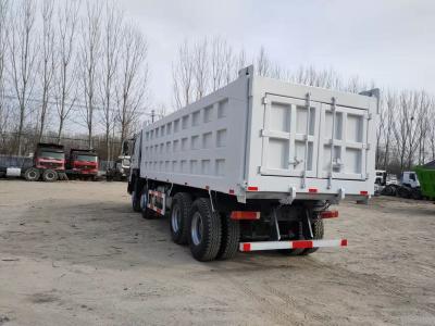 중국 유로 3 SINO TRUCK 12 휠 LHD 50tons 중고 8x4 사용 된 HOWO 킵 덤프 트럭 판매용