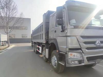 Chine 400 chevaux Sinotruk Howo LHD 12 roues 8x4 camions à bascule camions à décharge avec boîte de vitesses manuelle à vendre