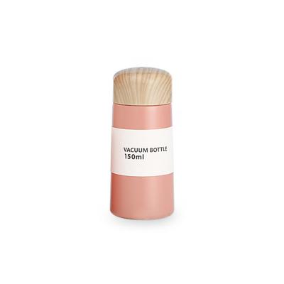 Chine Bouteille d'eau à double paroi en acier inoxydable à grain de bois mini pour une couleur personnalisée à vendre