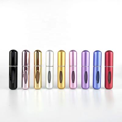 China Unisex Round Shape Fancy Mini Bottom Fill Refillable Aluminum Perfume Oil Bottles Set Pump Perfume Atomizer for sale