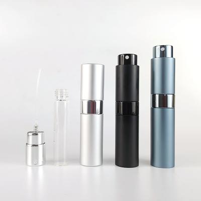 China Luxury Black Cylinder Men Perfume Sample Bottle Packaging 5Ml 8Ml 10Ml 15Ml 30Ml Twist up Perfume Atomizer for sale
