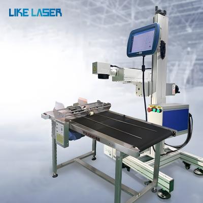 Cina Macchina di marcatura laser volante a CO2 certificata CE per l'industria dei confezionamenti di medicinali alimentari a base di frutta in vendita