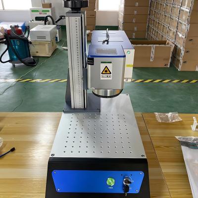 Cina 50kw bottiglia da bere Marcatura orario bandiere produttori di marchi profumi macchina di marcatura laser UV in vendita