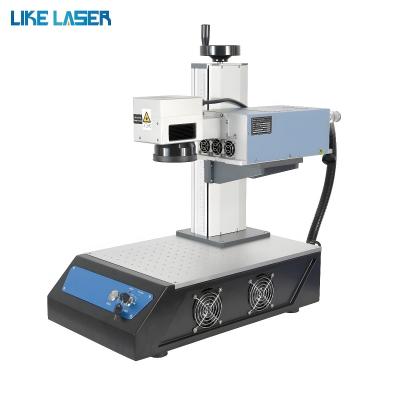 Cina Macchina di marcatura laser per bottiglie di profumi di vetro con laser invisibile e lunghezza d'onda di 355 nm in vendita